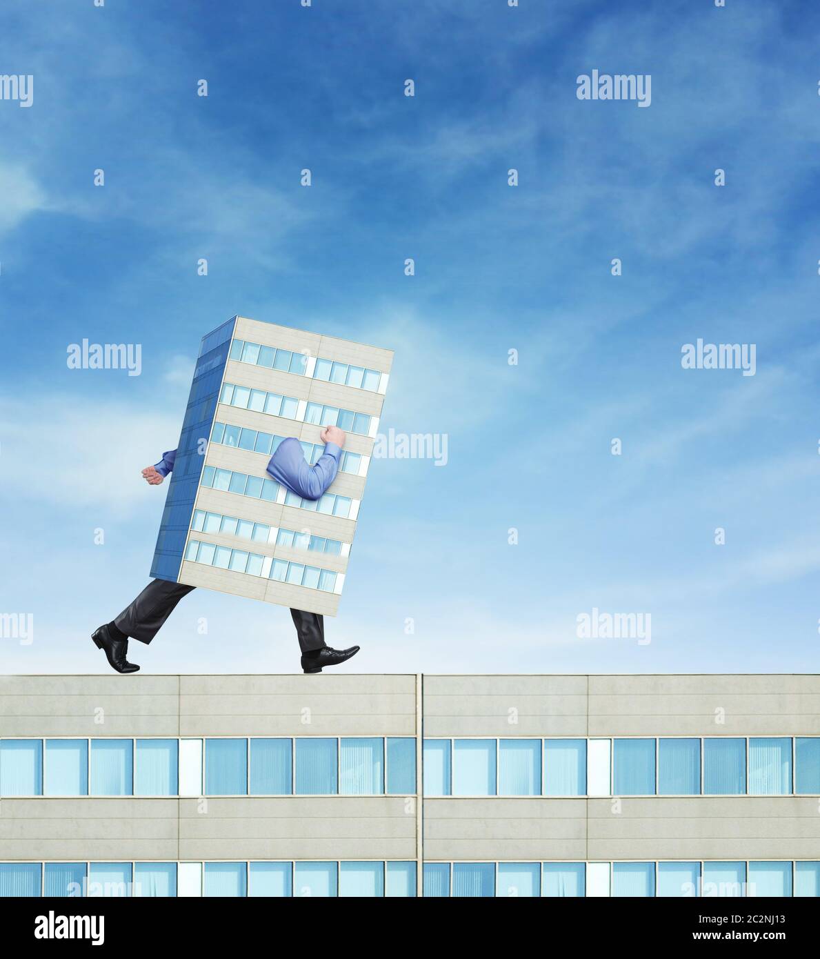 Skyscraper as a businessman is going forward Stock Photo - Alamy