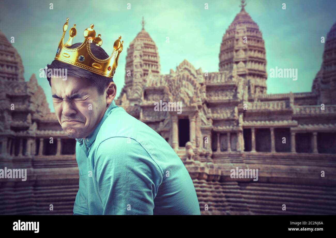 Portrait of a crying prince against asian temple Stock Photo - Alamy