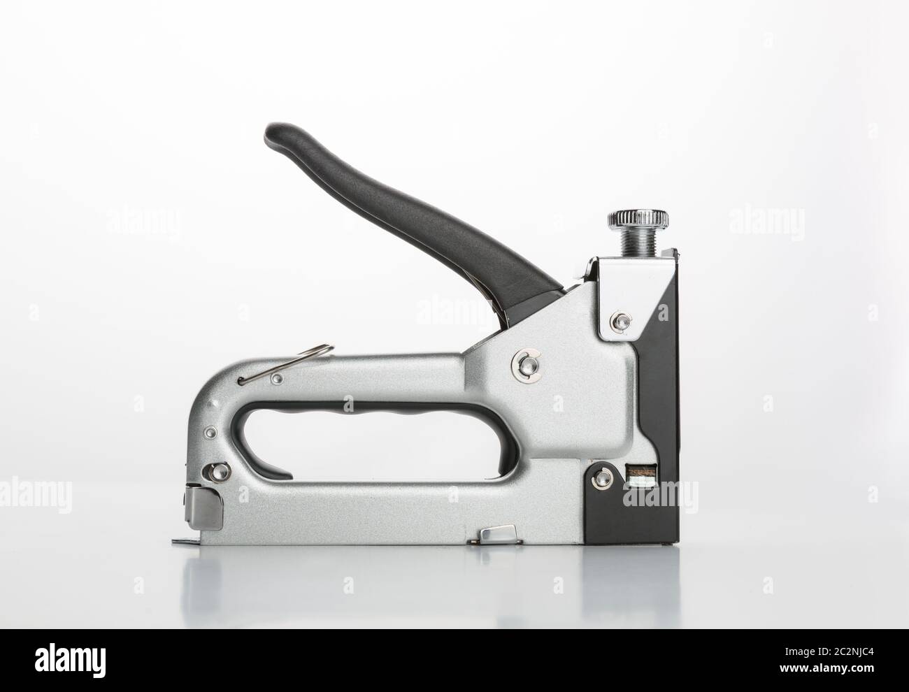 Industrial stapler isolated on white Stock Photo - Alamy