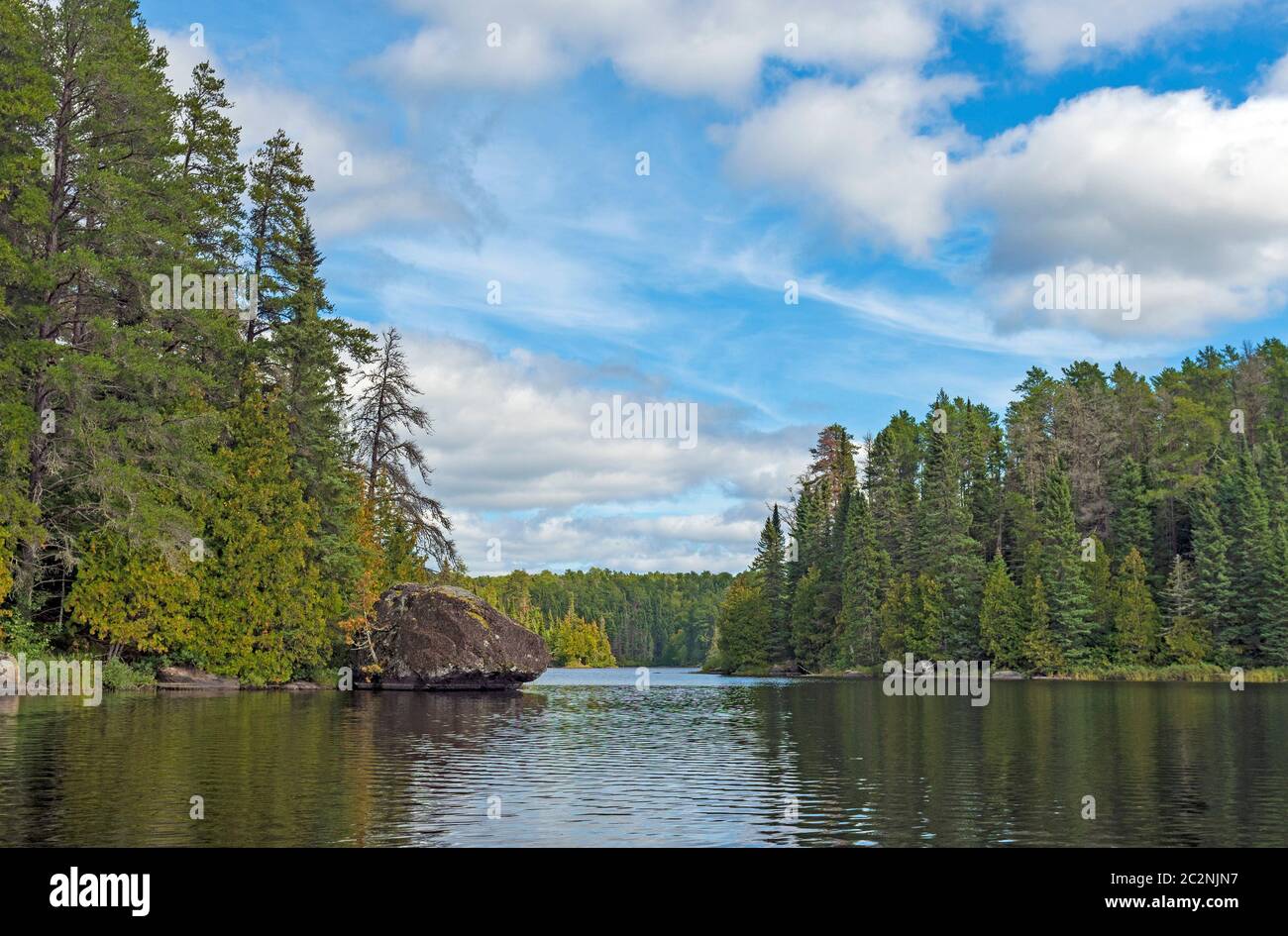 Clouds and Sun in the North Woods on Long Island Lake in the Boundary ...