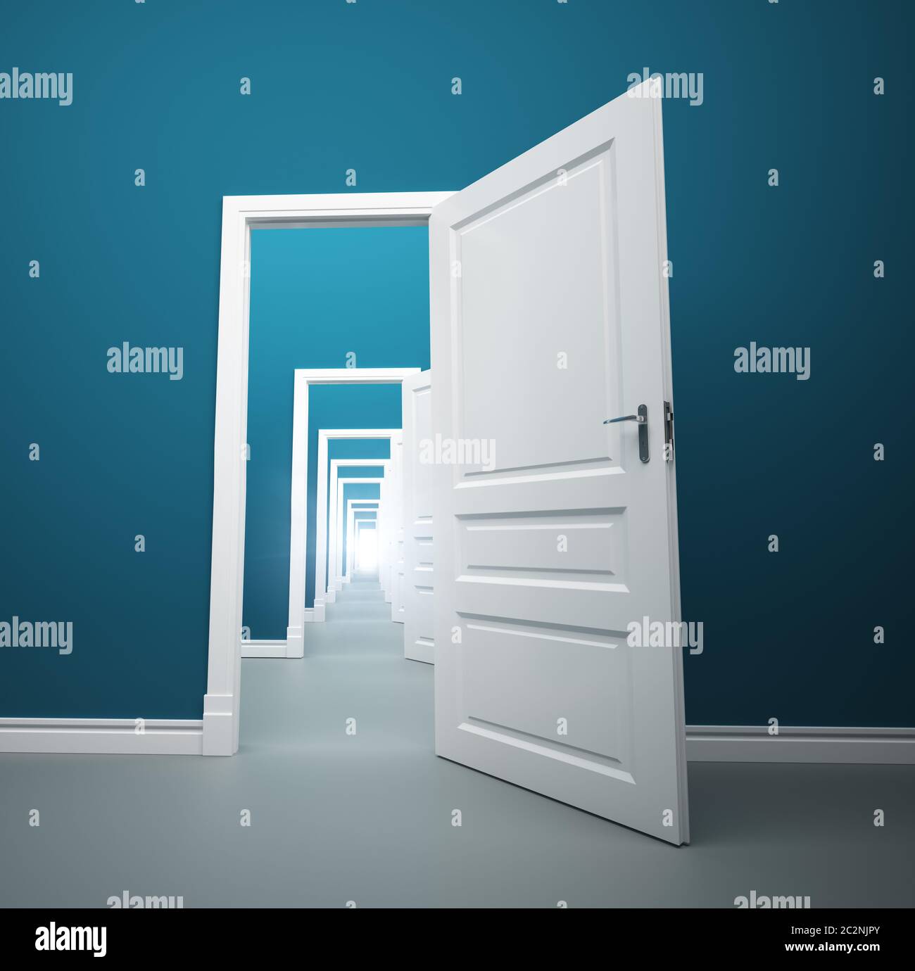 Long way of opened doors with light at the end Stock Photo - Alamy