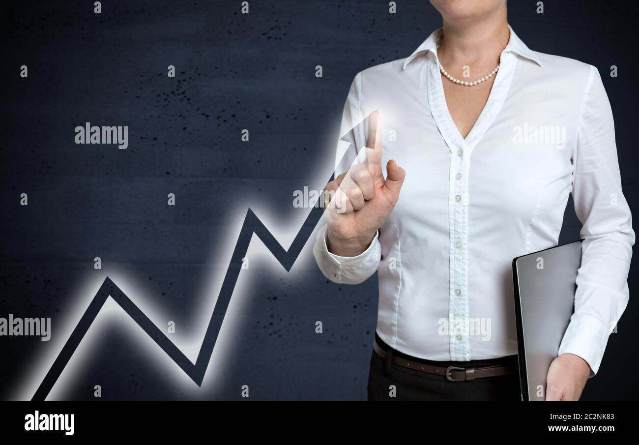 Graph touchscreen is shown by businesswoman Stock Photo - Alamy