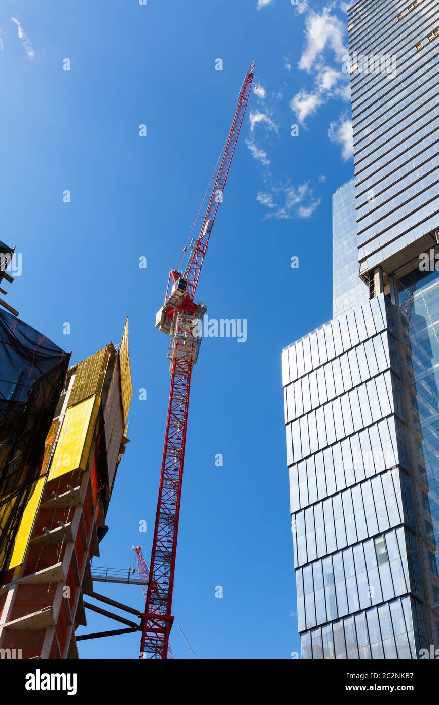 Skyscraper construction technology with crane. City tower building ...