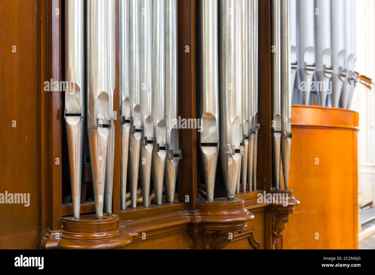 Organ pipes closeup, antique musical instrument in cathedral church ...