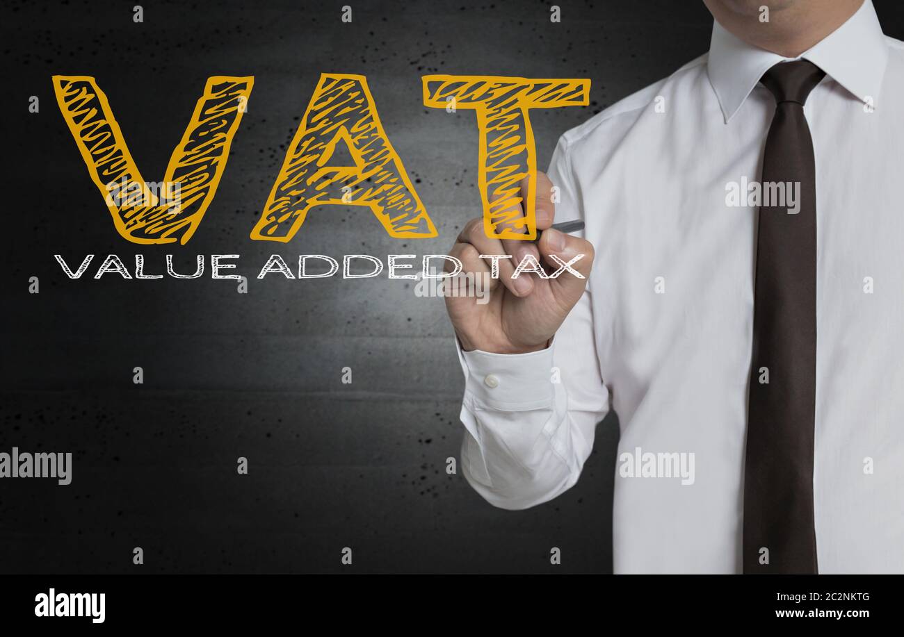 VAT is written by businessman on screen Stock Photo - Alamy