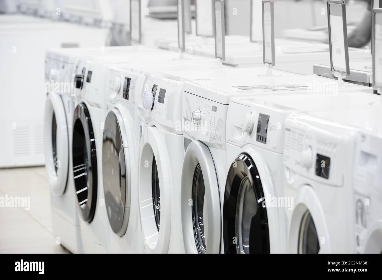 washing mashines in appliance store Stock Photo - Alamy