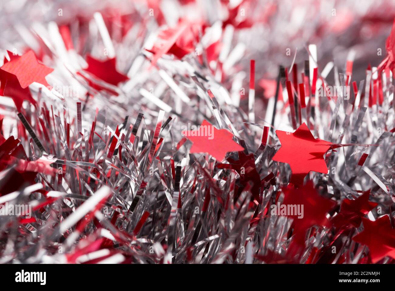 Close up of red christmas streamer Stock Photo - Alamy