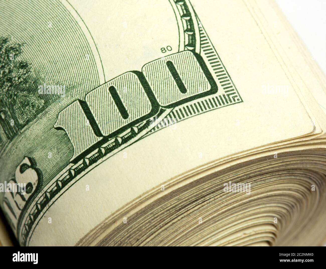 Close-up view of roll of $100 bills Stock Photo - Alamy
