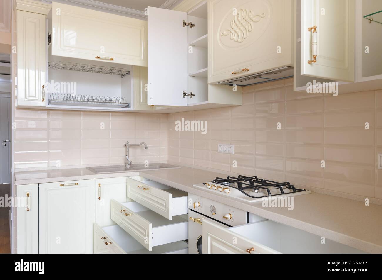 Classic cream colored kitchen Stock Photo - Alamy