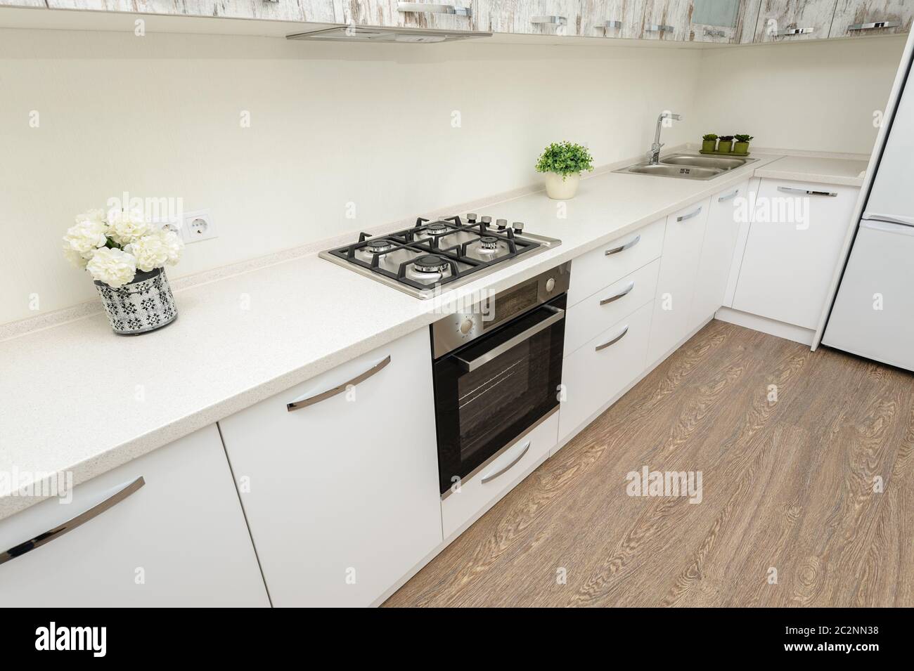 Modern white kitchen interior Stock Photo - Alamy