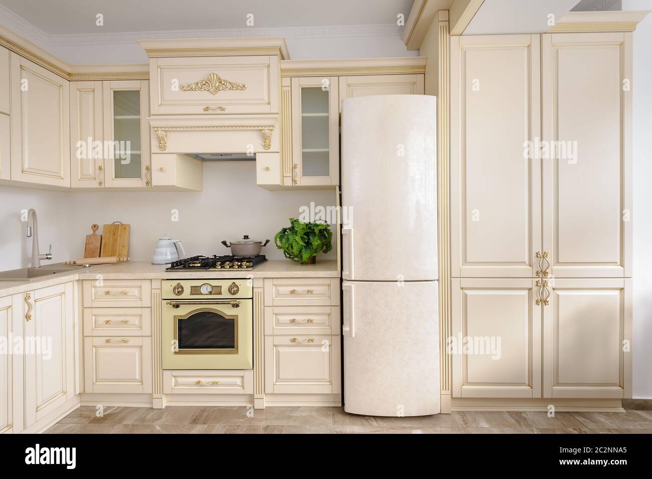Modern beige colored luxury kitchen Stock Photo - Alamy