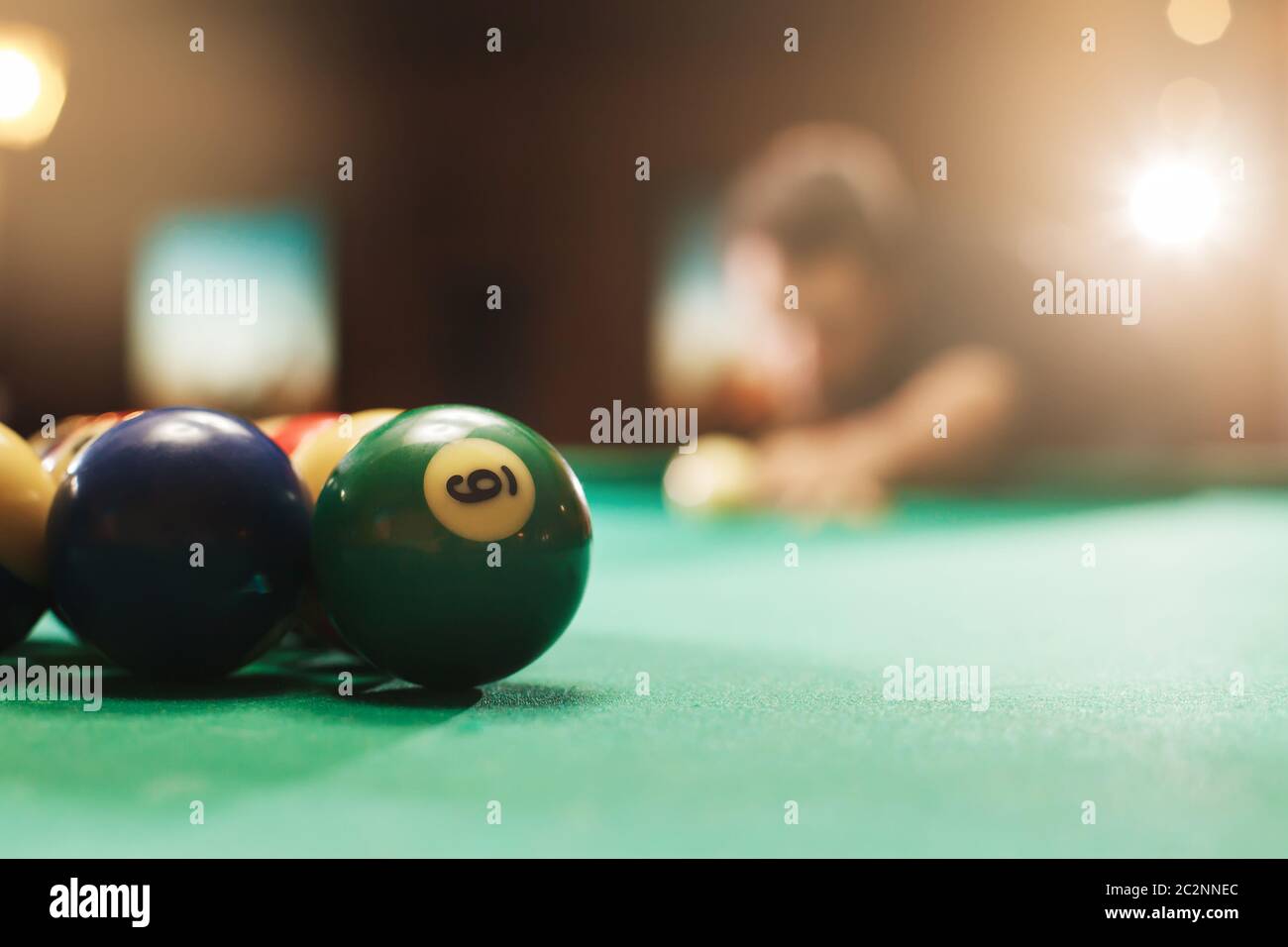 Player has prepared to hit the balls in pool. Nightlife. Pool room on ...