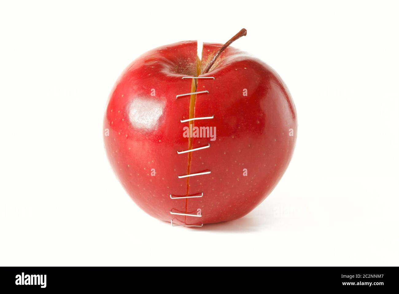 Broken red apple Stock Photo - Alamy