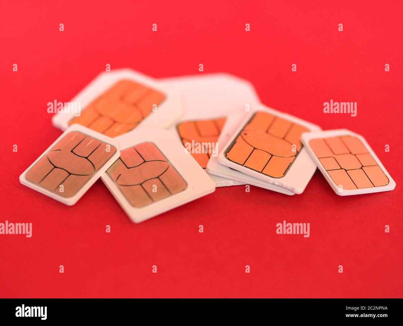 Many mini micro and nano sim cards for mobile telephone Stock Photo - Alamy