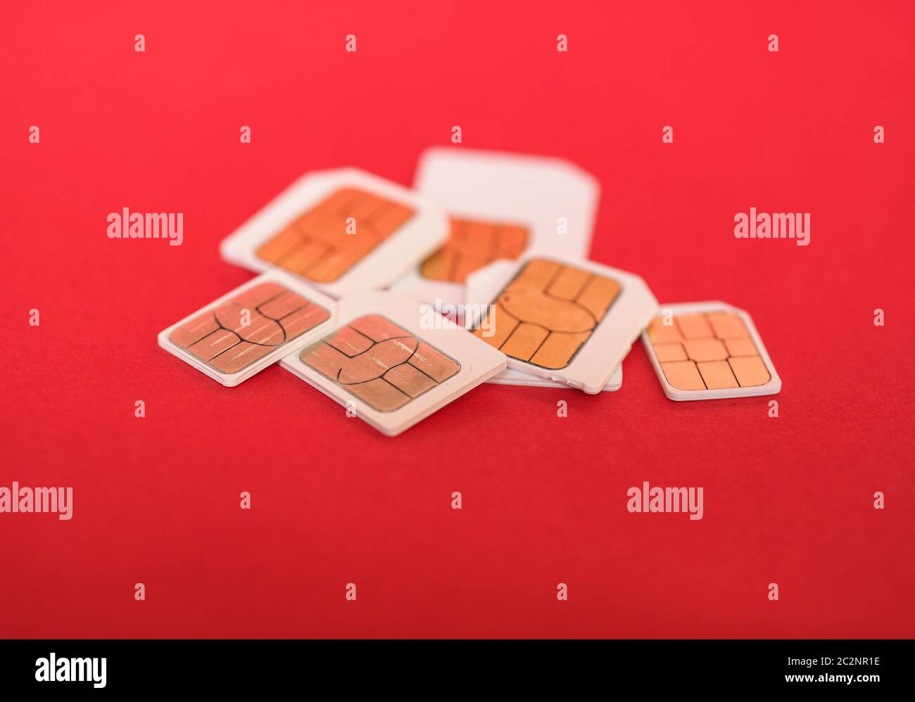 Many mini micro and nano sim cards for mobile telephone Stock Photo - Alamy