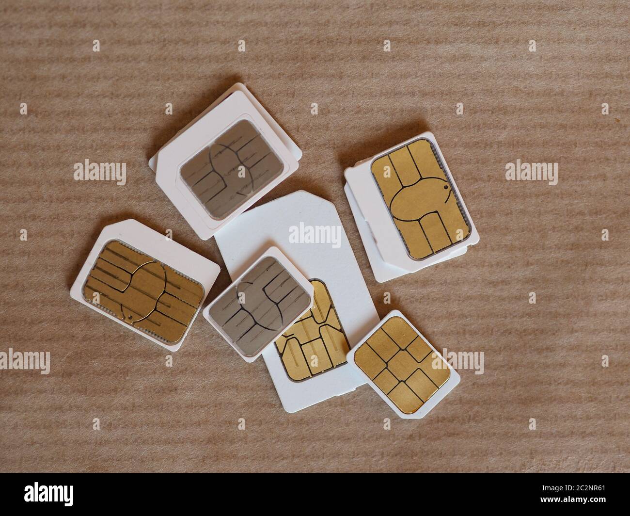 Many mini micro and nano sim cards for mobile telephone Stock Photo - Alamy