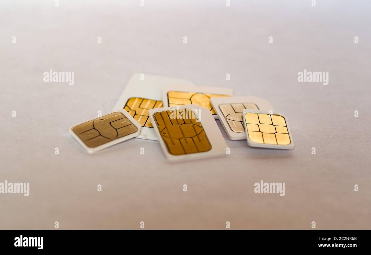 Many mini micro and nano sim cards for mobile telephone Stock Photo - Alamy
