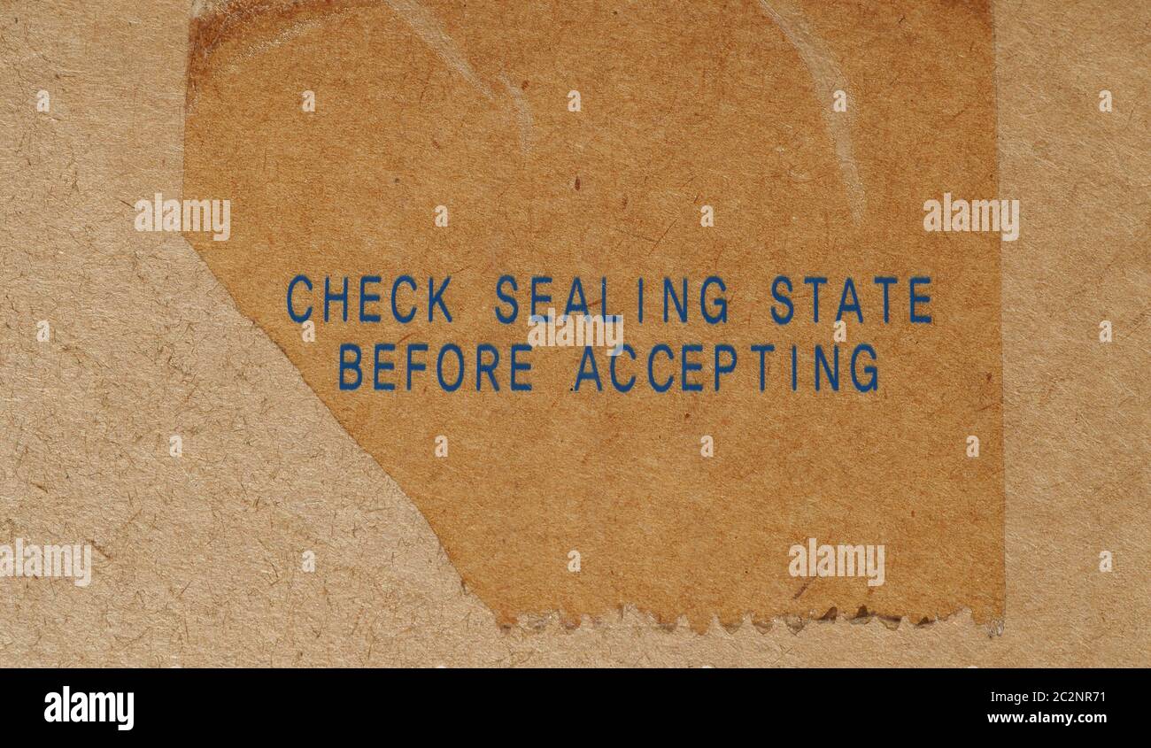 check sealing state before accepting warning sign label on packet Stock ...