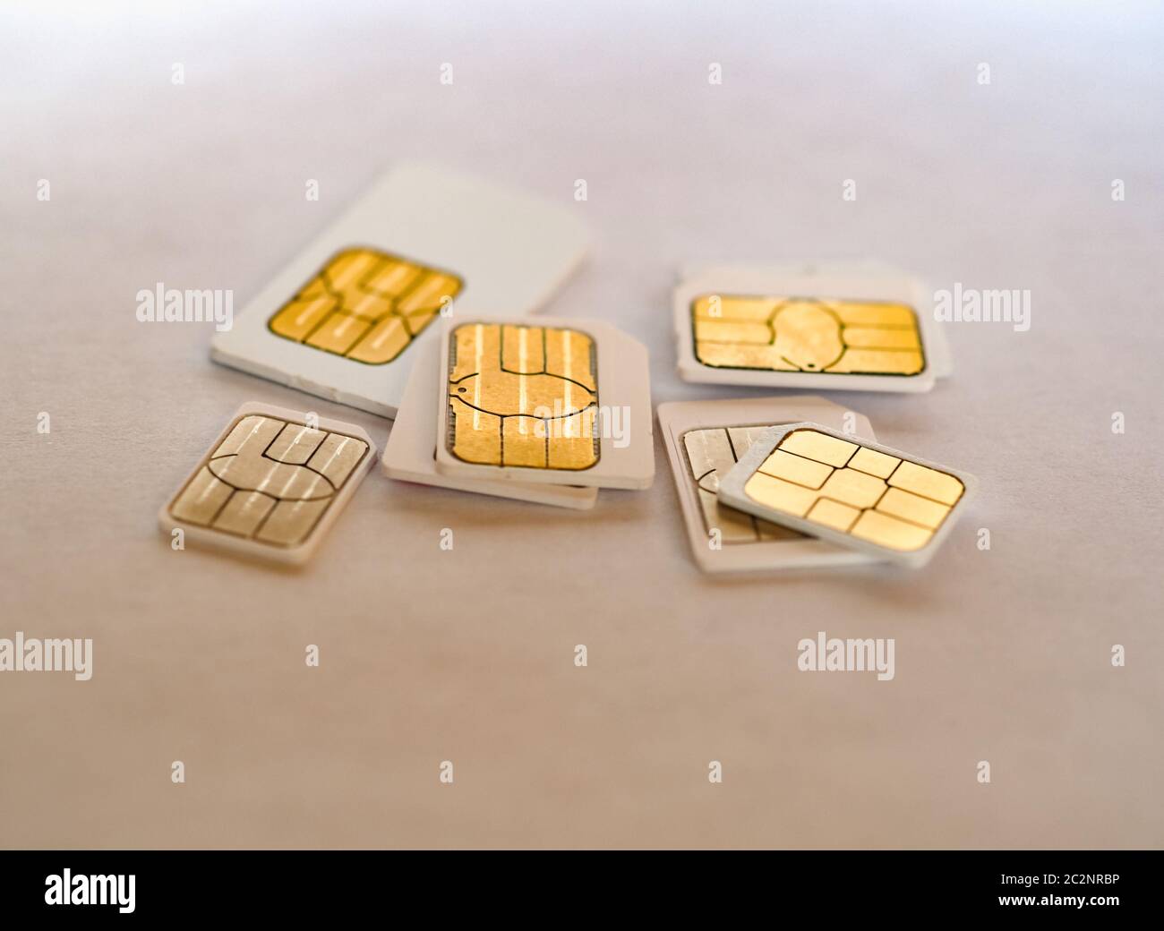 Many mini micro and nano sim cards for mobile telephone Stock Photo - Alamy