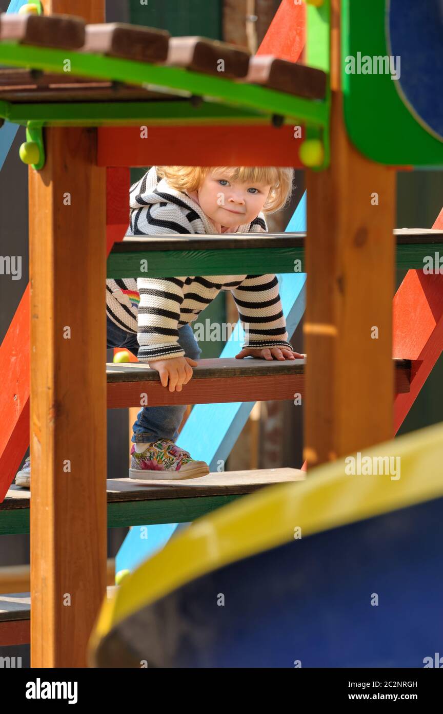 Child climbing stairs hi-res stock photography and images - Alamy
