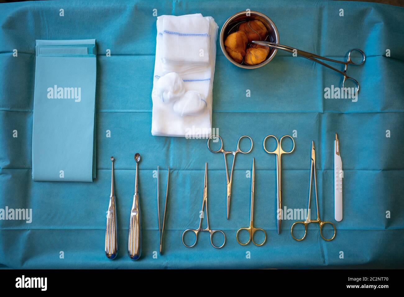 in an operating room there is an instrument table for performing wound ...