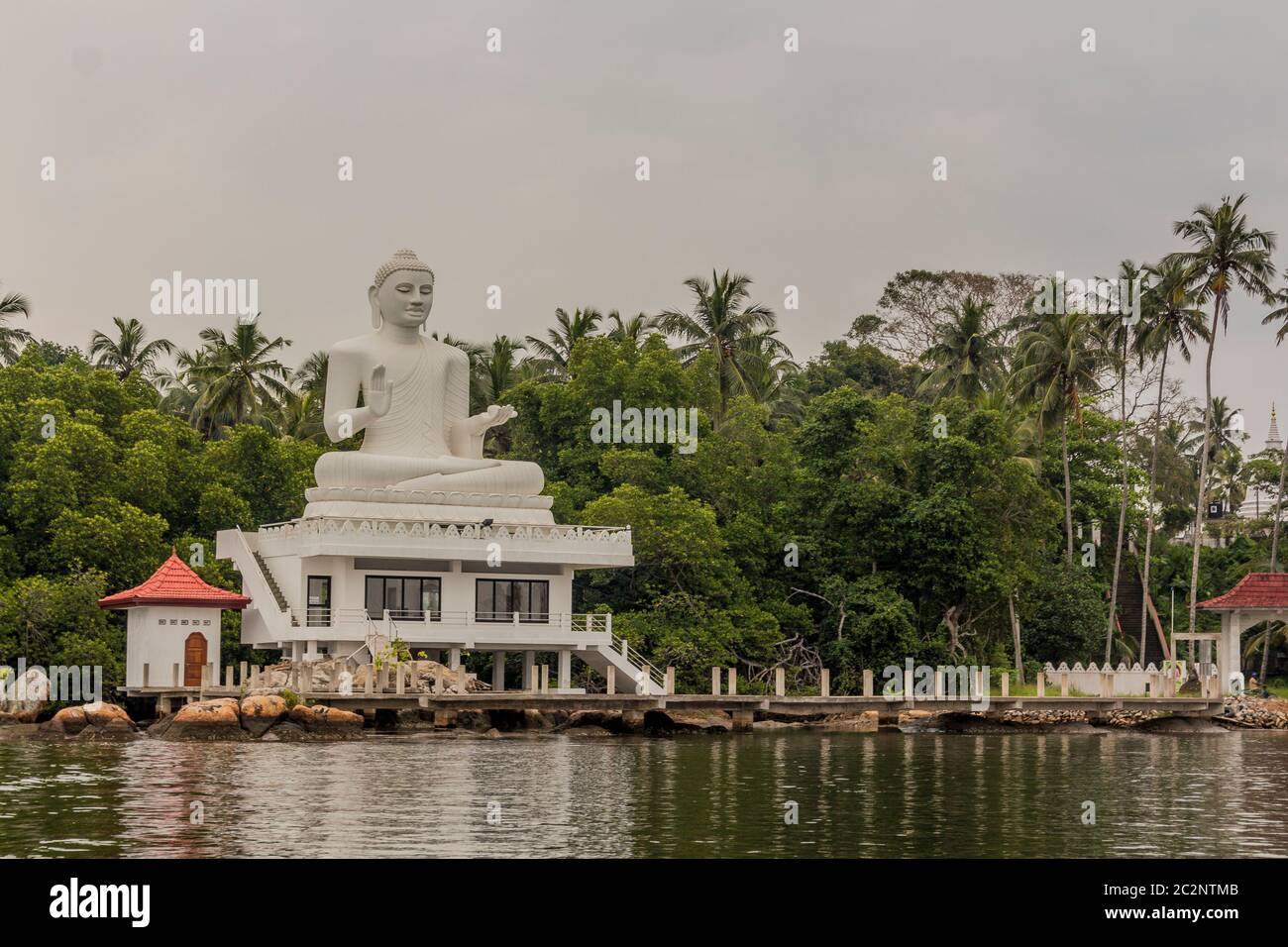 White Udakotuwa Temple in Bentota, Sri Lanka. Huge, white Buddha statue ...