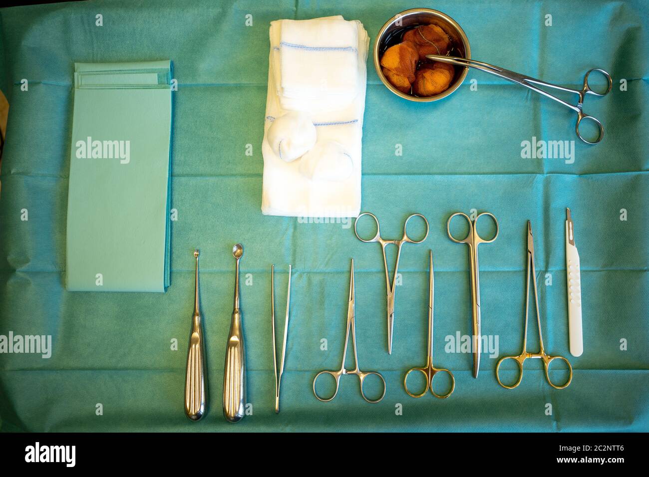 in an operating room there is an instrument table for performing wound ...