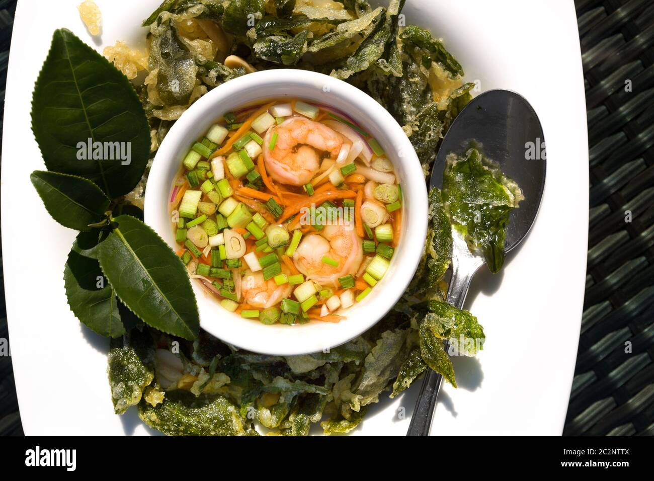 Stir Fried Tea Leaf Salad. Traditional thai food fried green tea leaves ...
