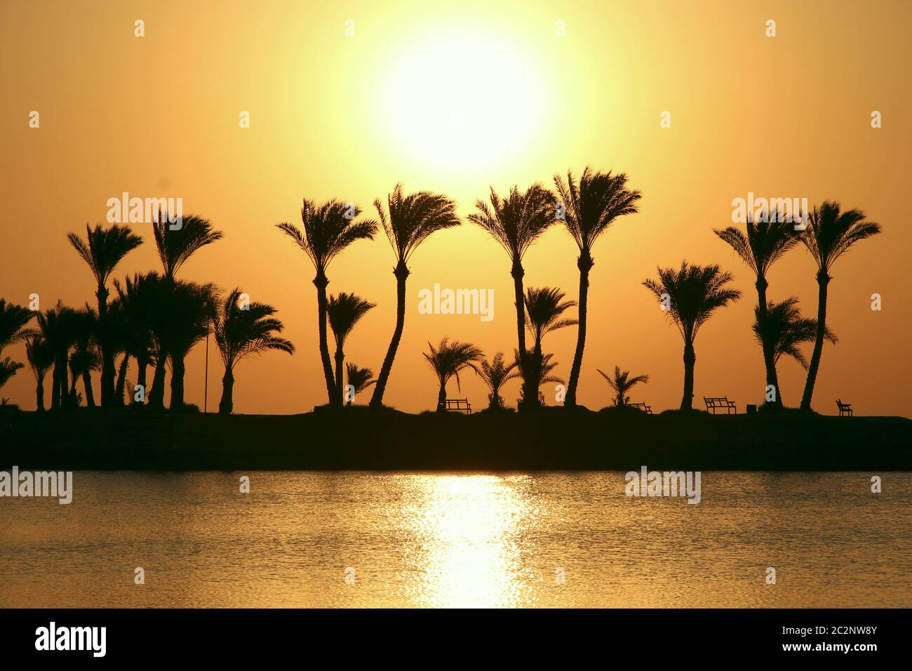 Exotic vacation in tropical resort. Dawn over tropical island. Sunset ...