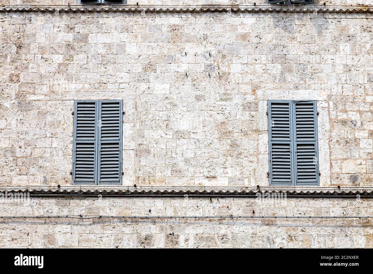 windows in the facades of ancient medieval houses Stock Photo - Alamy
