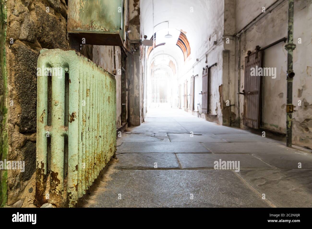 Old prison hallway. Prison hallway with light at the end Stock Photo ...