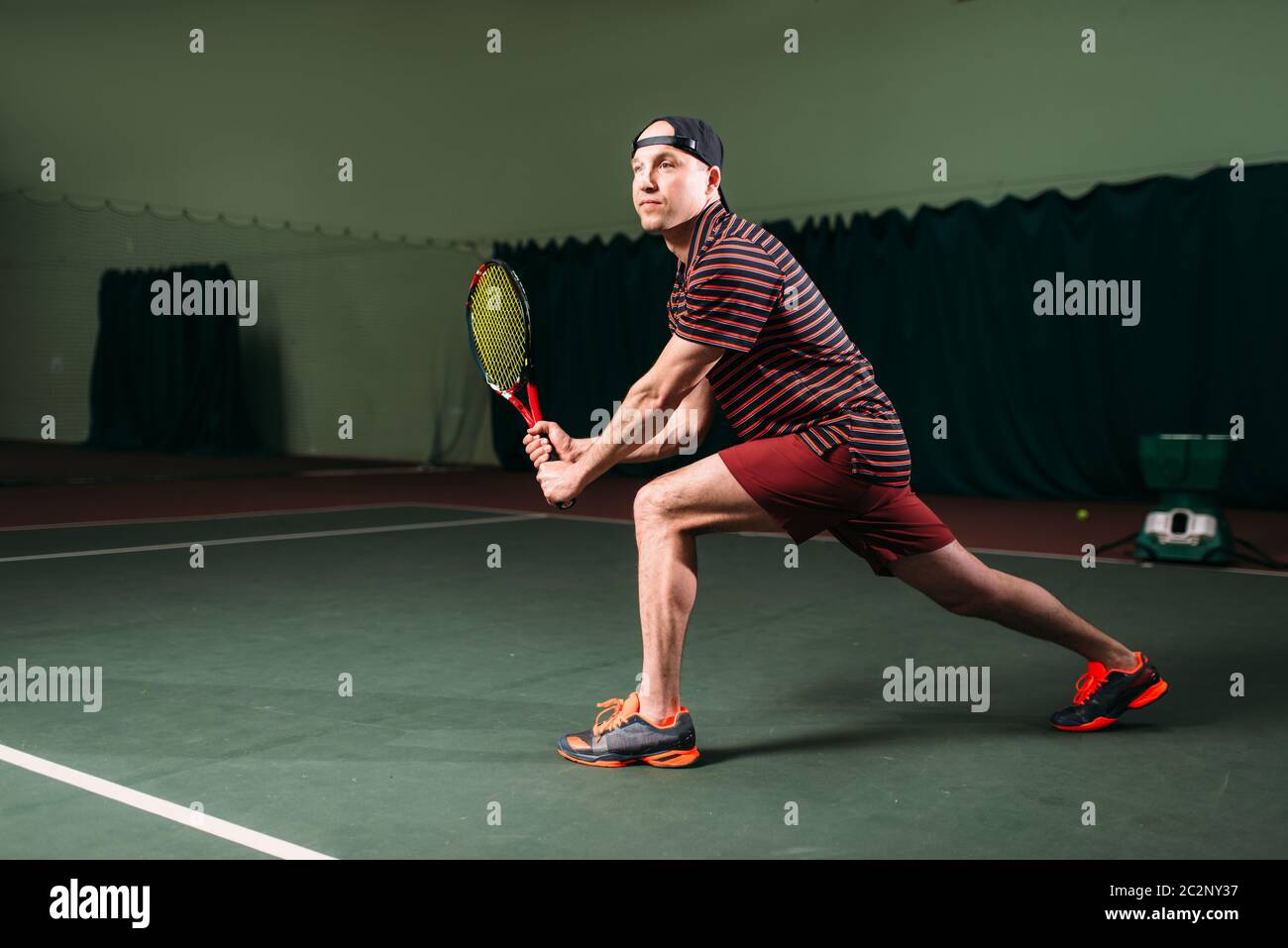 Teenager holding tennis racket hi-res stock photography and images - Alamy