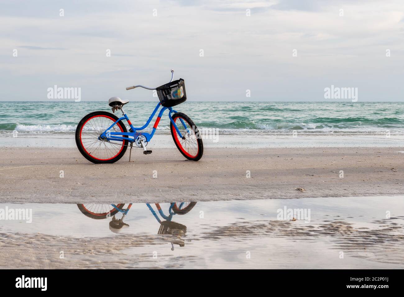 Bicycle on the beach Stock Photo - Alamy