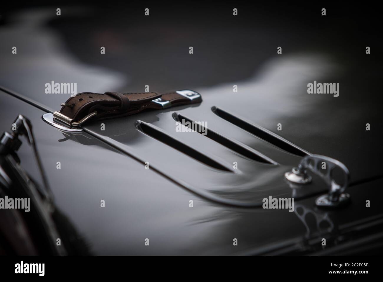 Vintage leather car hood strap hi-res stock photography and images - Alamy