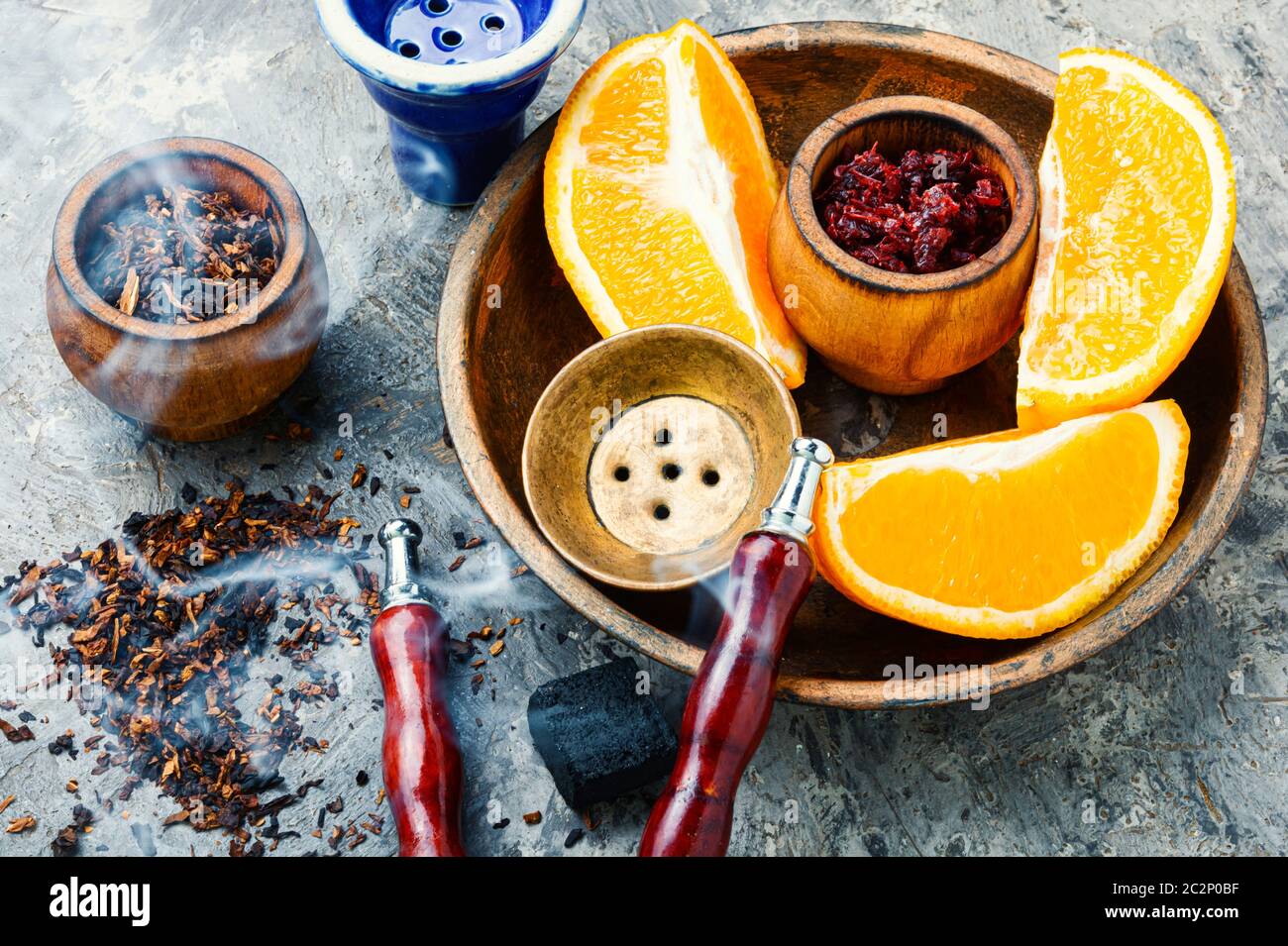 Smoking turkish shisha with orange.Details of Oriental hookah.Egyptian ...