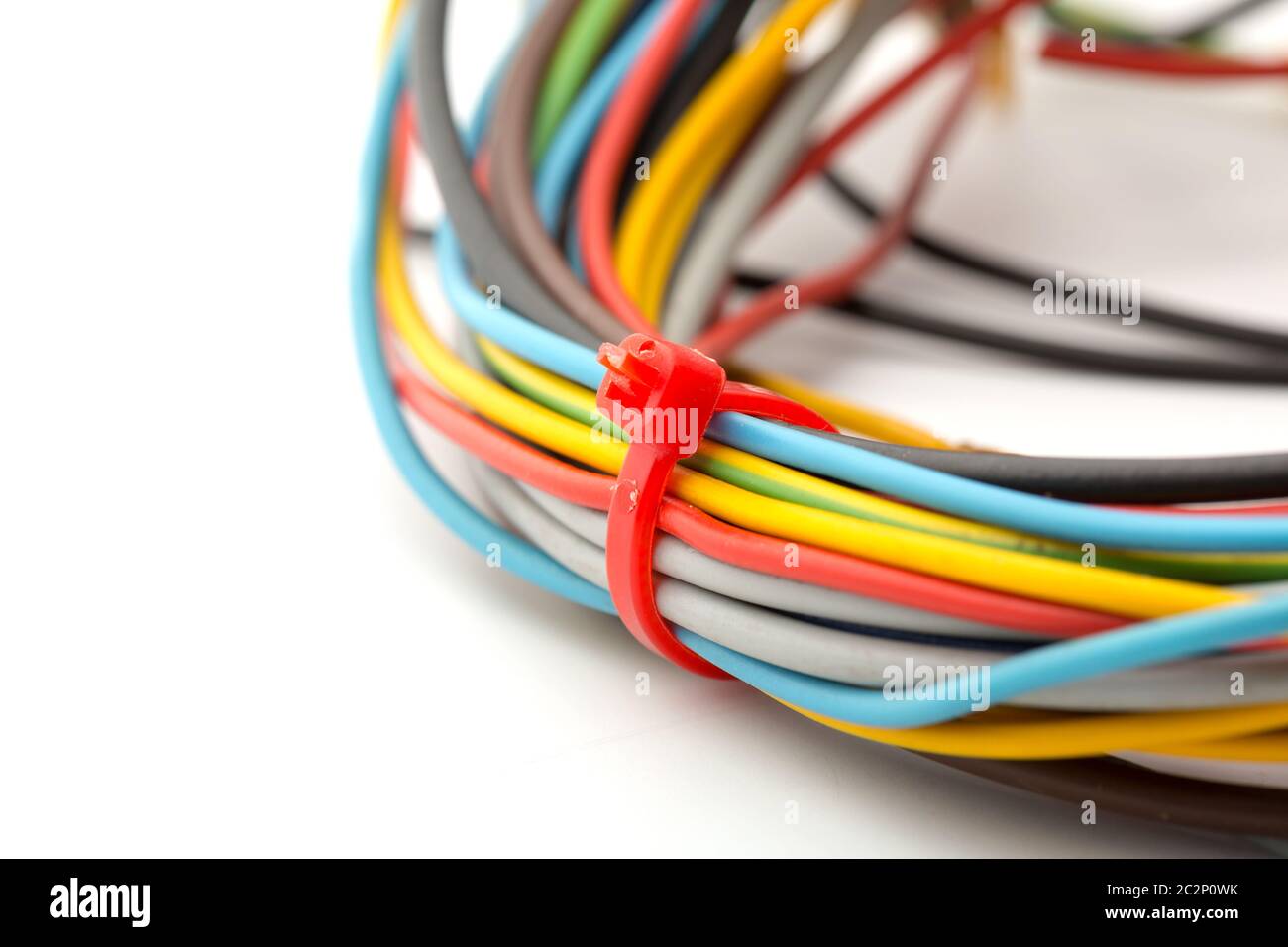 Colorful cables isolated on white Stock Photo - Alamy