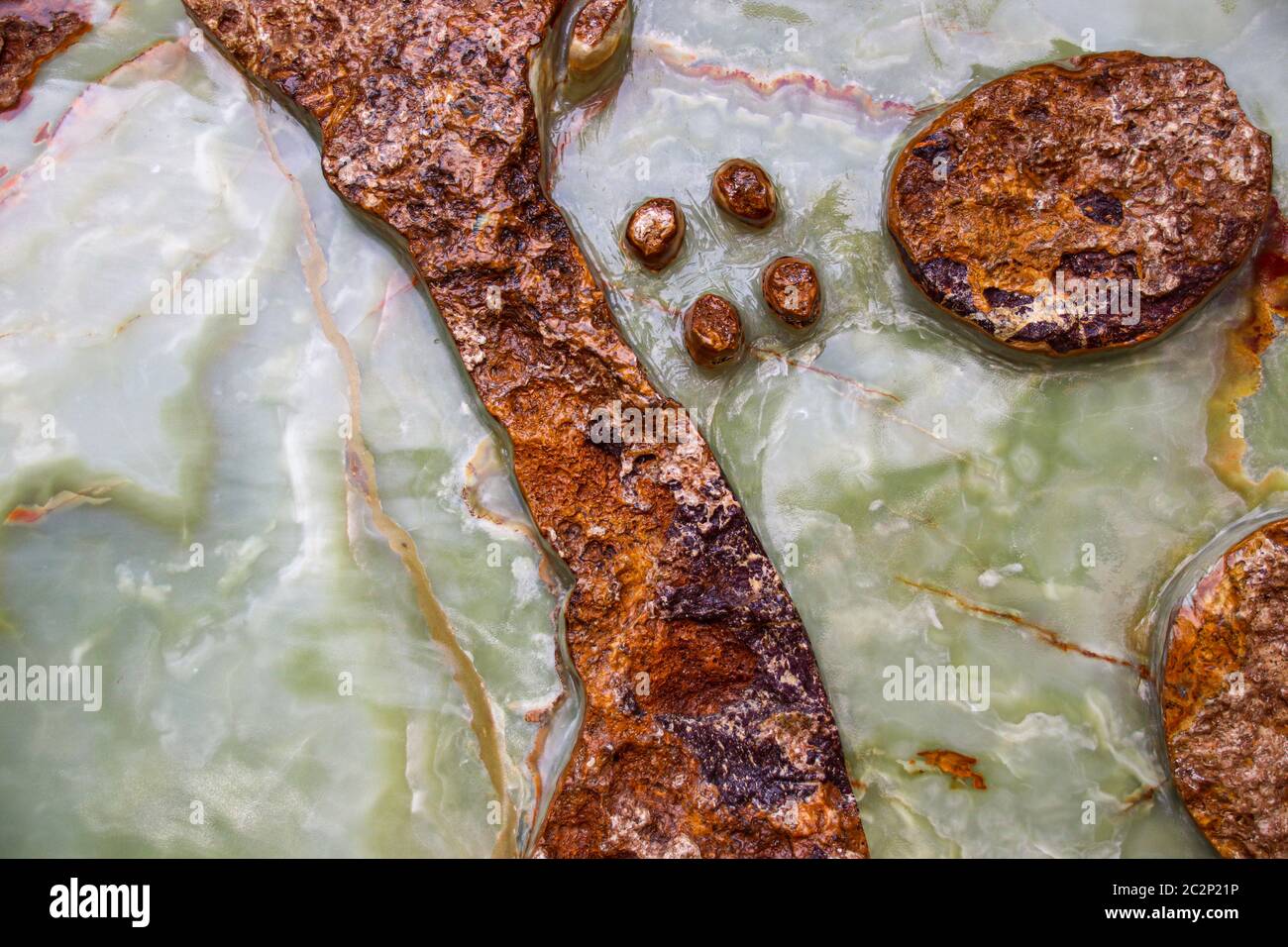 Close up of the texture and patterns of a cut raw jade rock Stock Photo ...