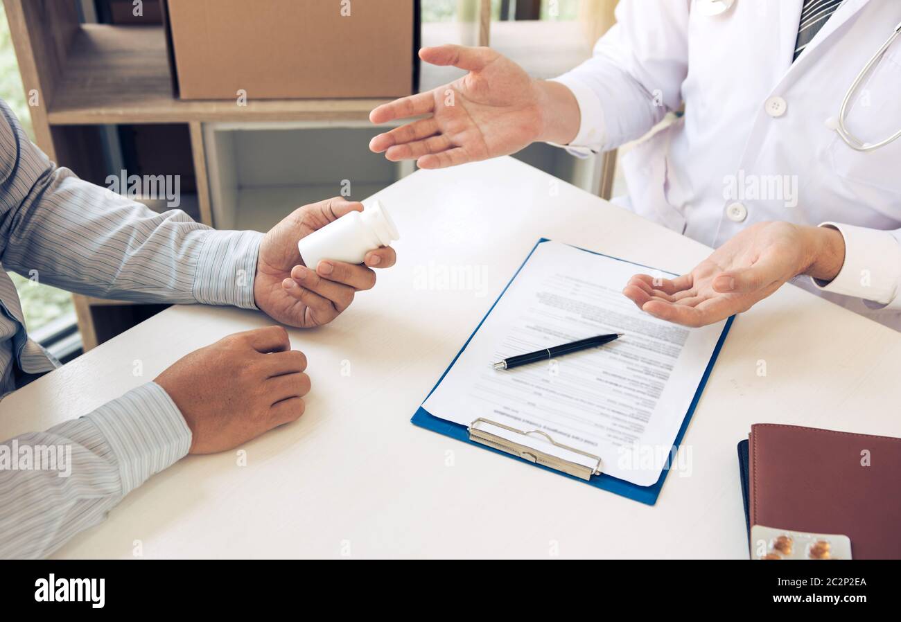 Doctor is explaining the drug's properties to the patient and ...