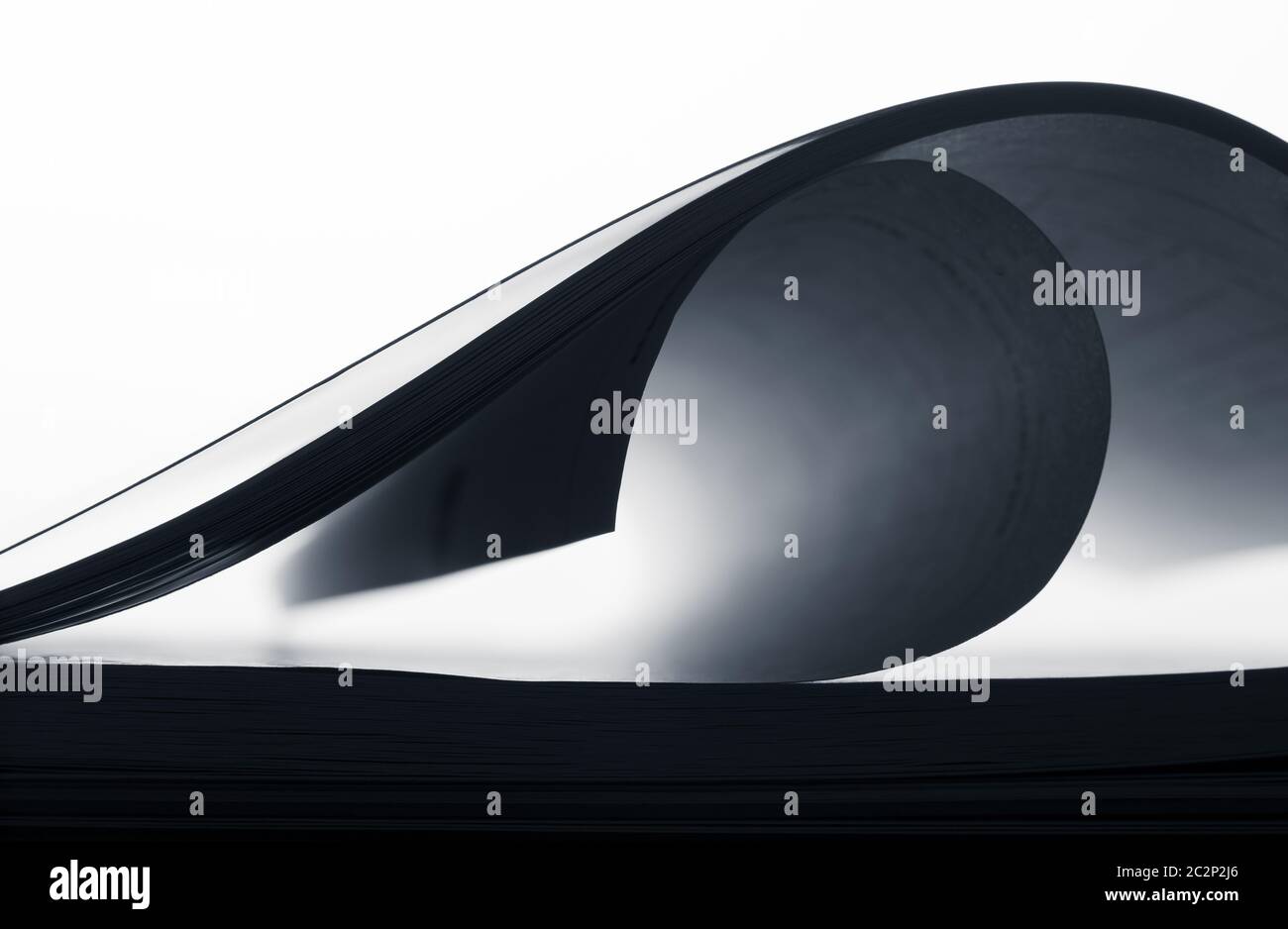 Paper sheets forming abstract curves Stock Photo - Alamy
