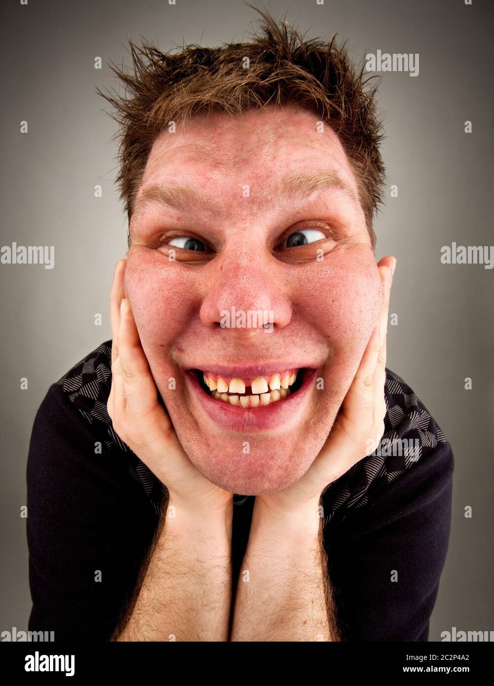 Portrait of crazy bizarre man making faces Stock Photo - Alamy