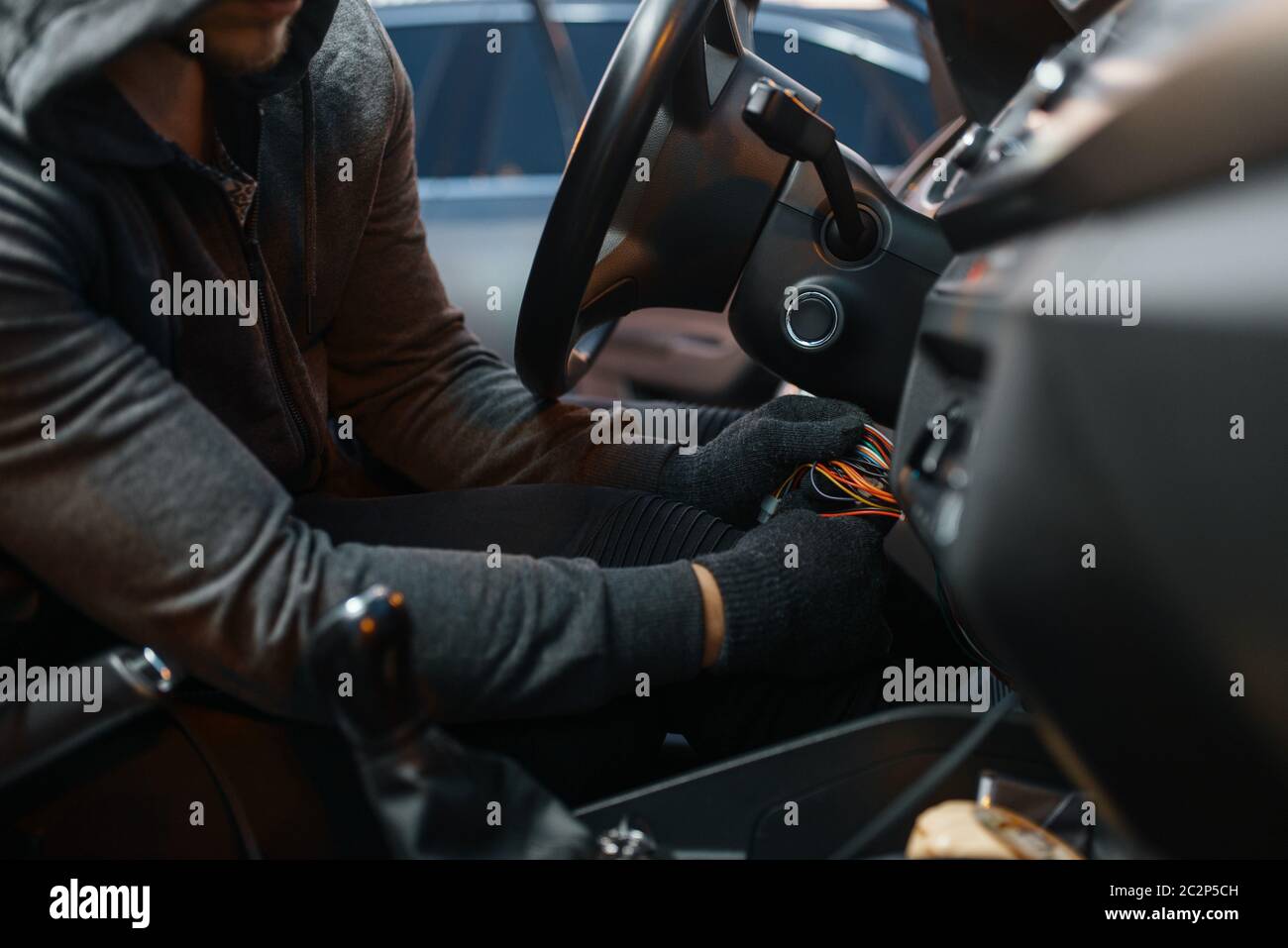 Professional car thief hacking ignition lock, criminal lifestyle ...