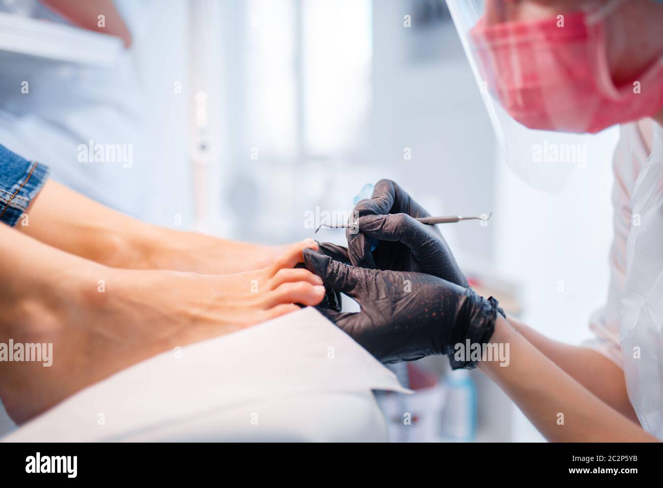 Cosmetologist salon, pedicure, polish procedure. Nail care treatment ...