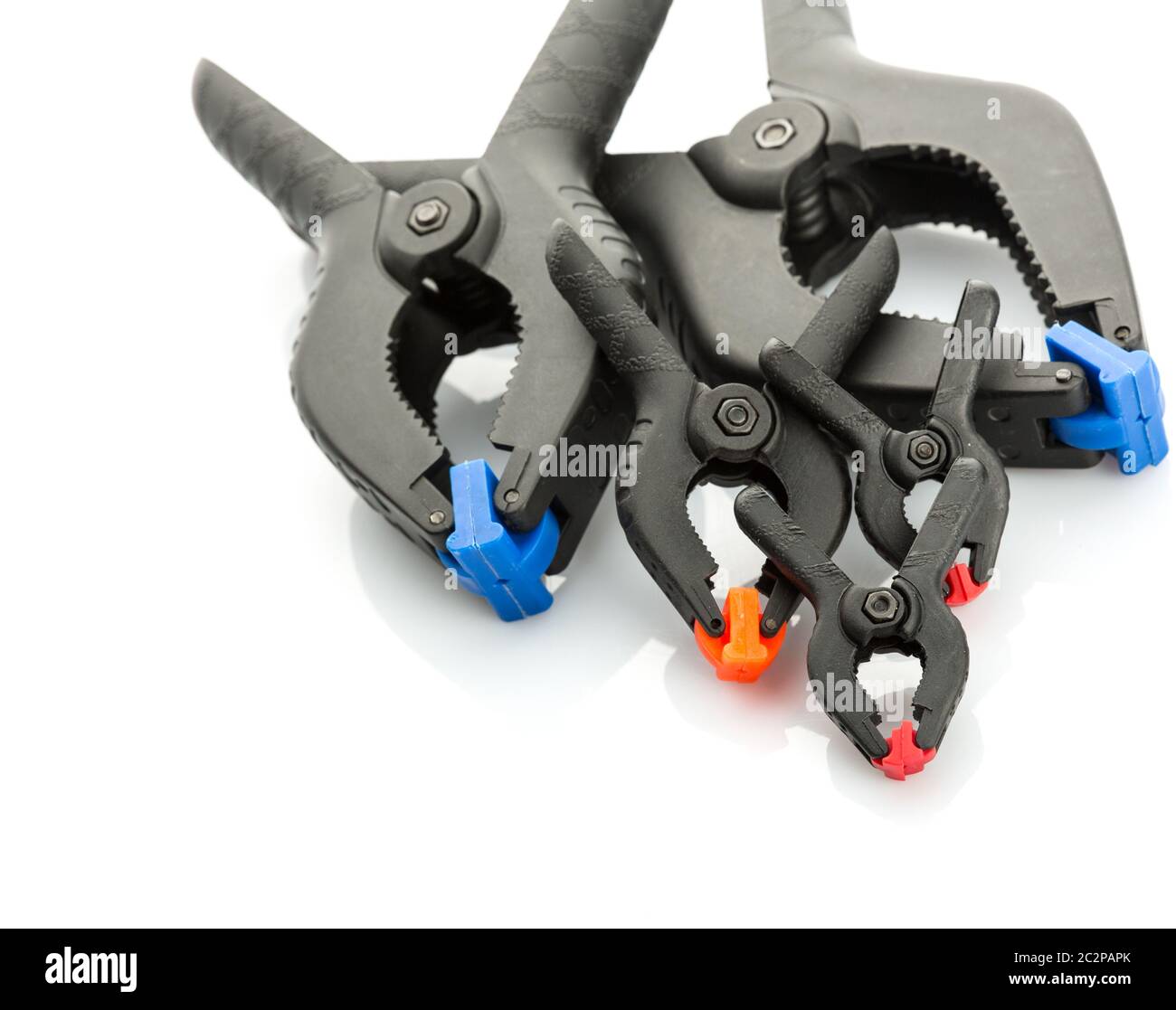 Set of plastic clamps isolated on white background Stock Photo - Alamy