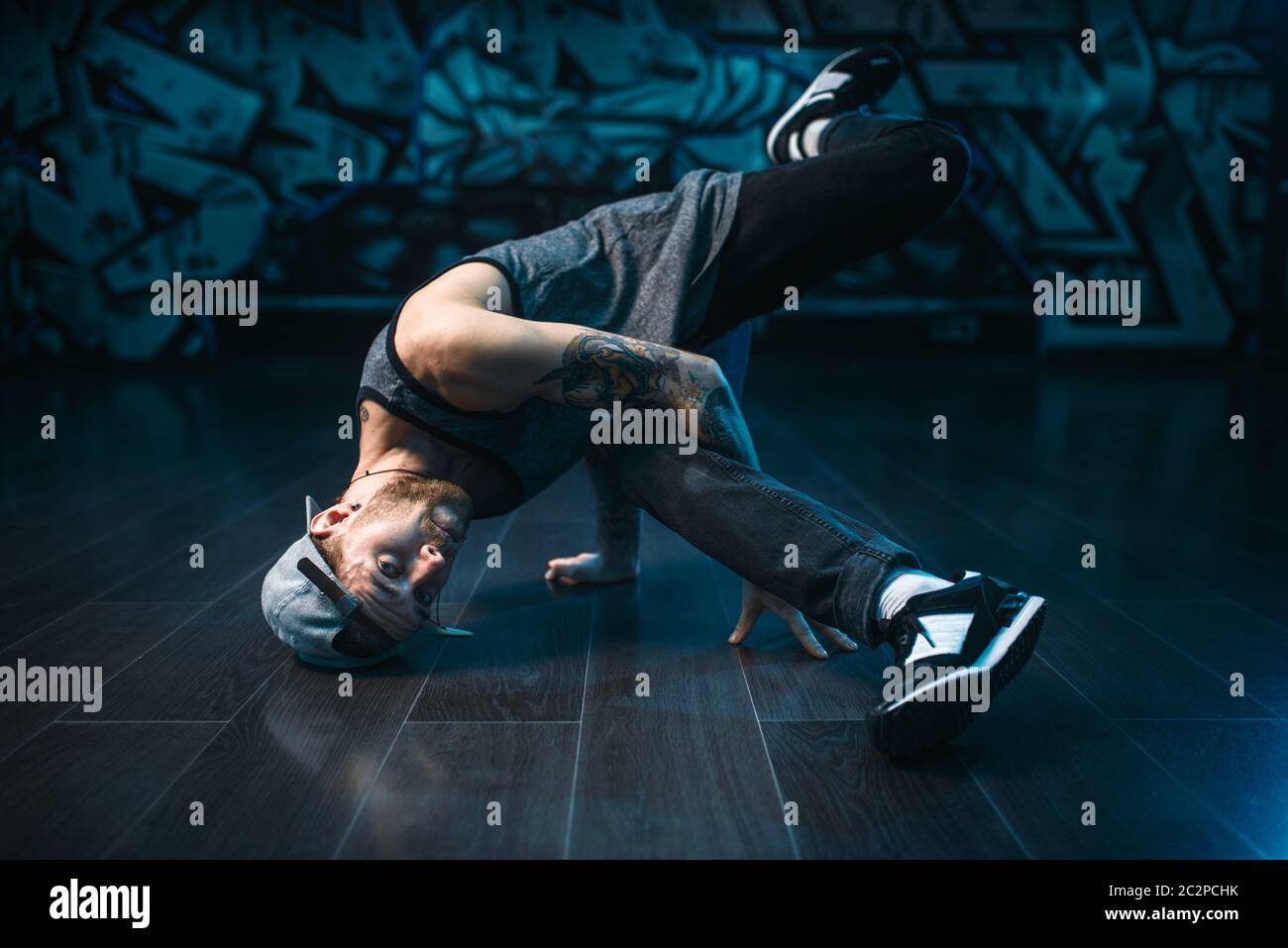 Male rapper in dance studio, trendy lifestyle. Modern urban dancing style Stock Photo - Alamy