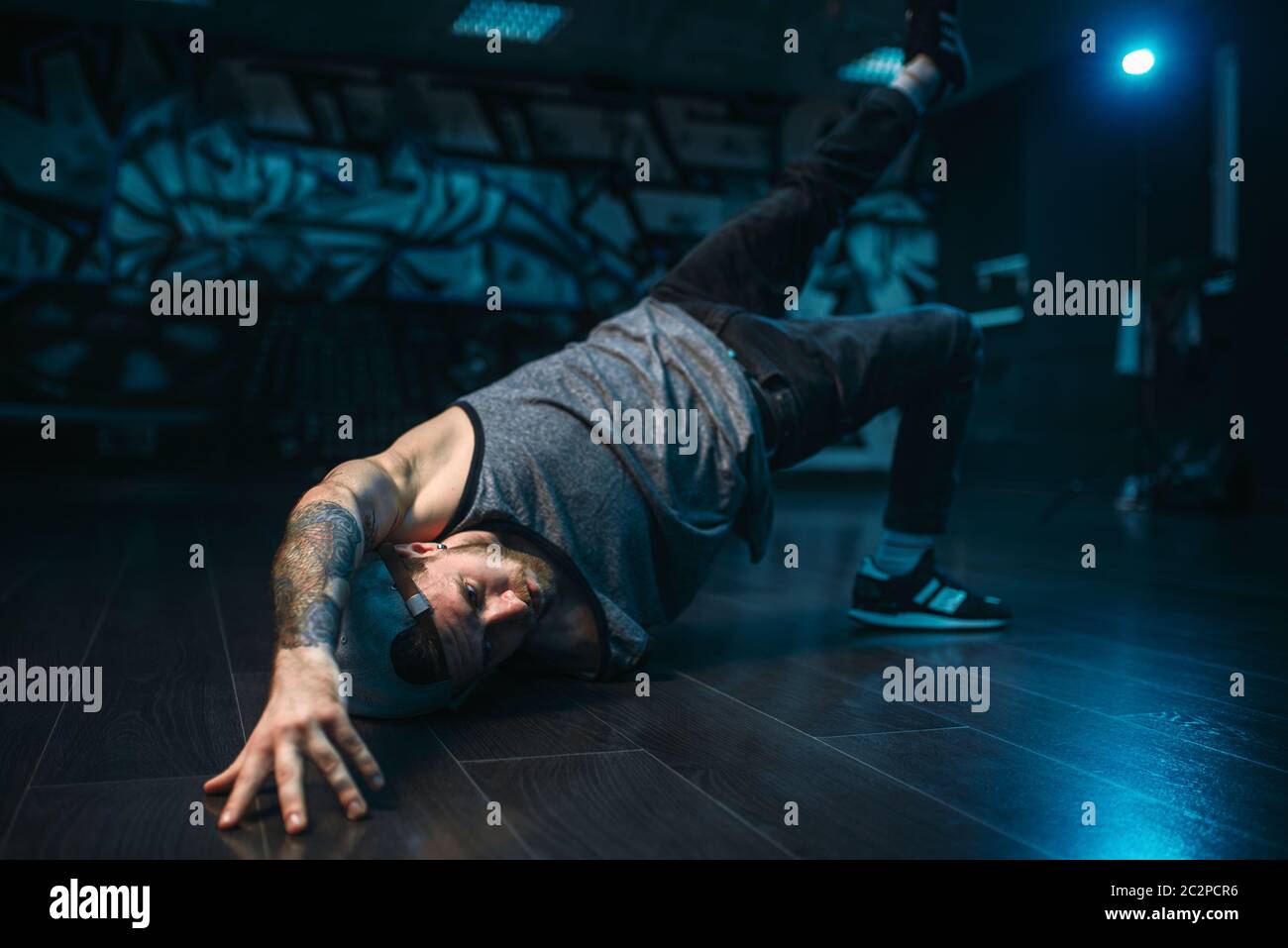 Breakdance motions, performer in dance studio. Modern urban dancing style Stock Photo - Alamy