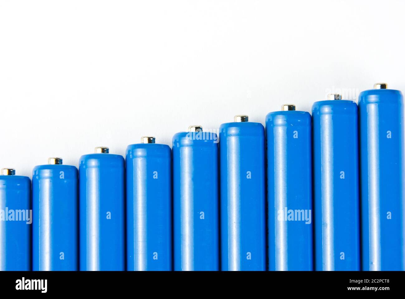 Row of blue batteries Stock Photo - Alamy