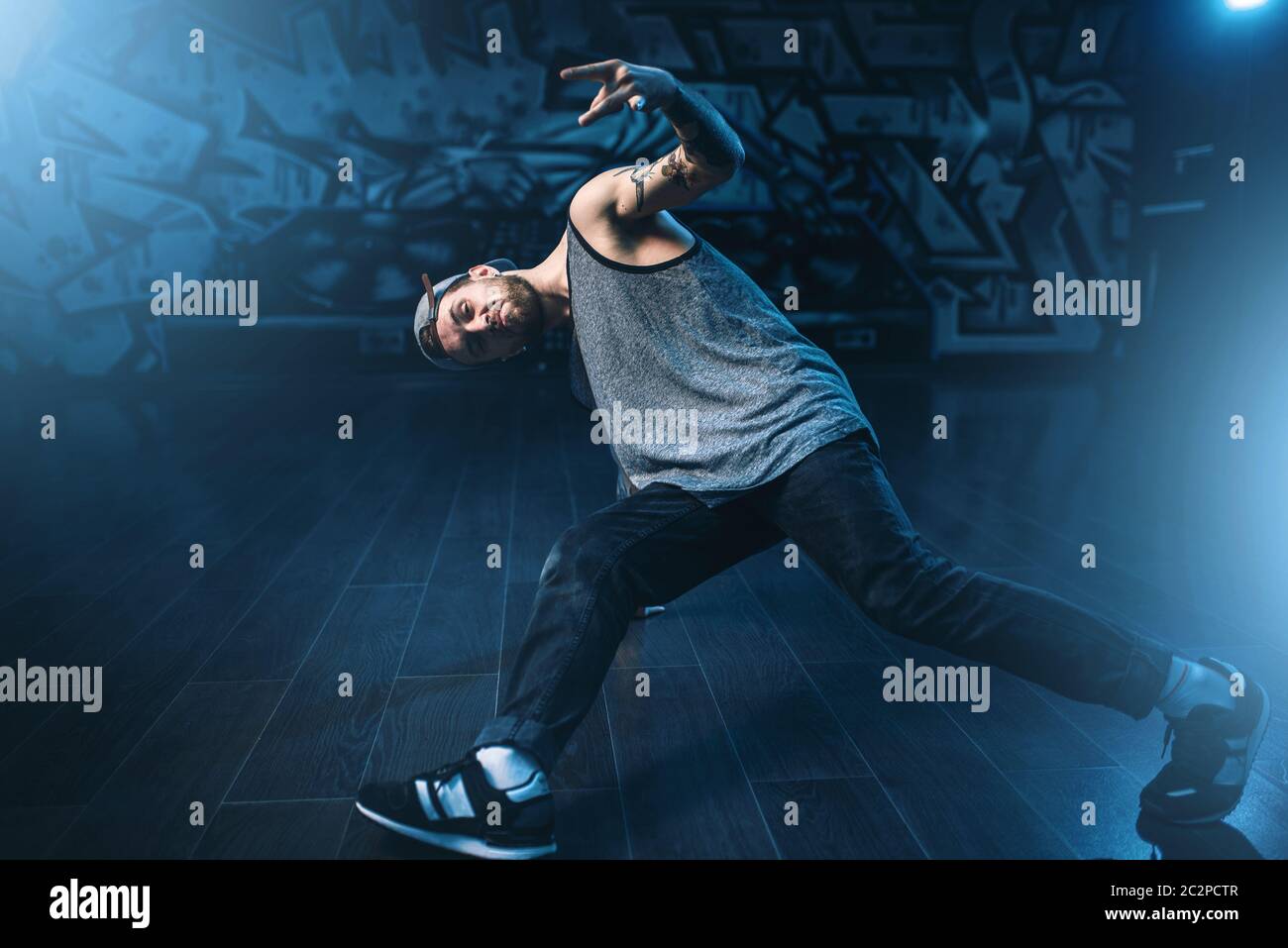 Breakdance performer posing in dance studio. Modern urban dancing style Stock Photo - Alamy