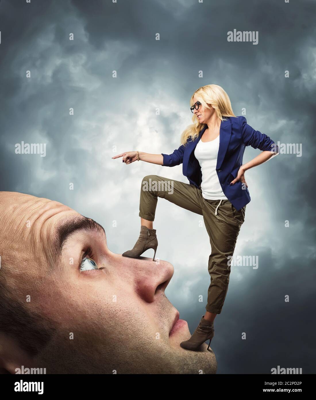 Woman standing on mans face hi-res stock photography and images - Alamy