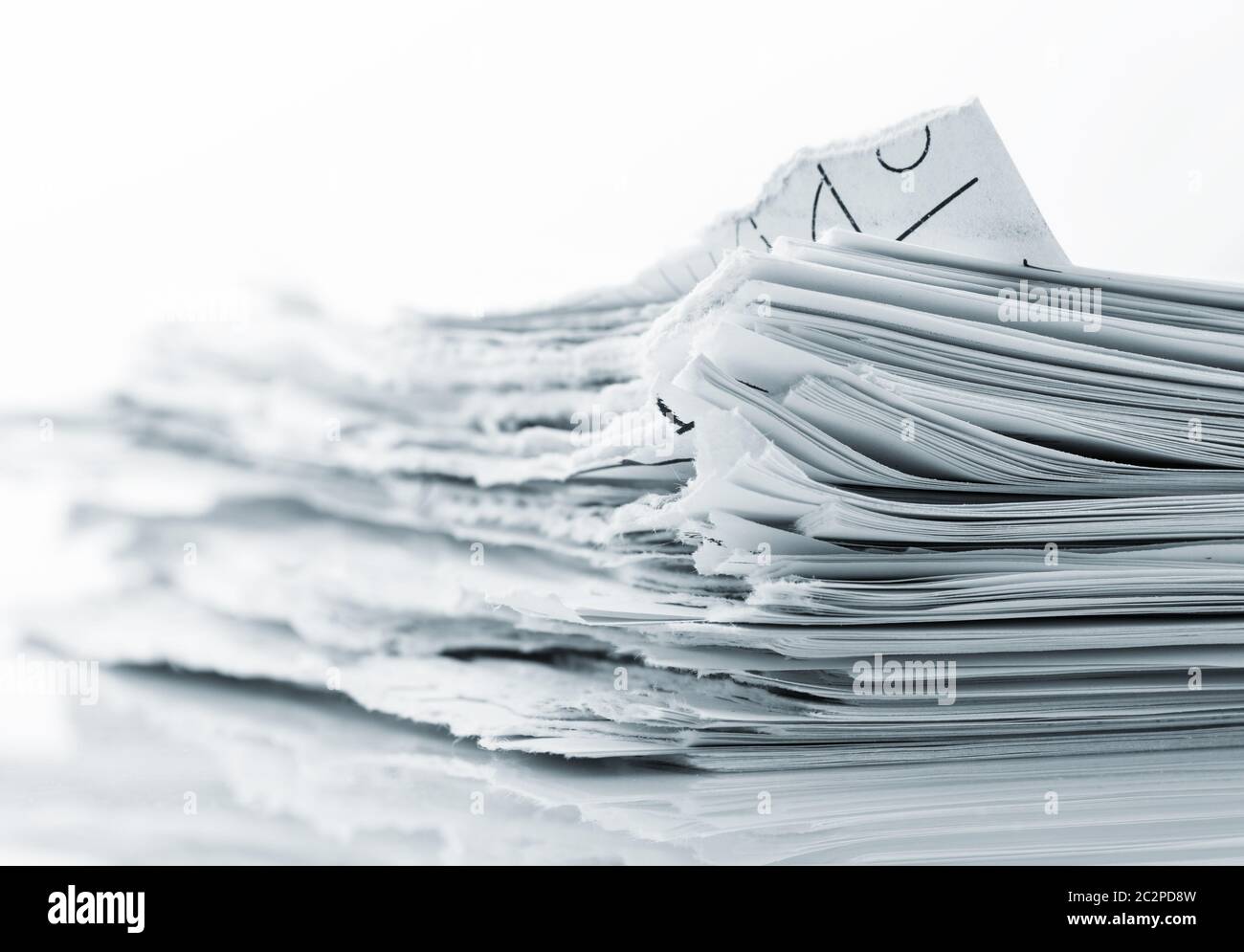 Pile of ragged paper sheets closeup picture Stock Photo - Alamy
