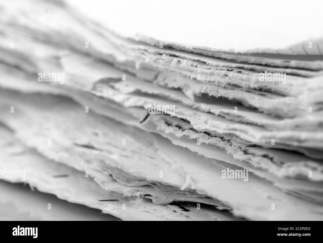 Ragged paper sheets closeup picture Stock Photo - Alamy